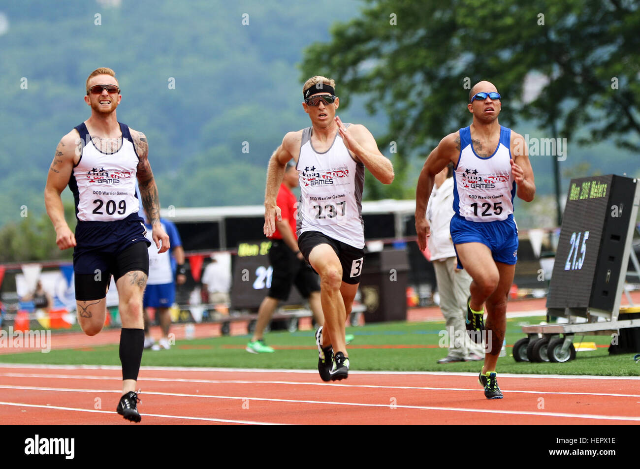 Athletes compete in men's track event during the 2016 Department of ...
