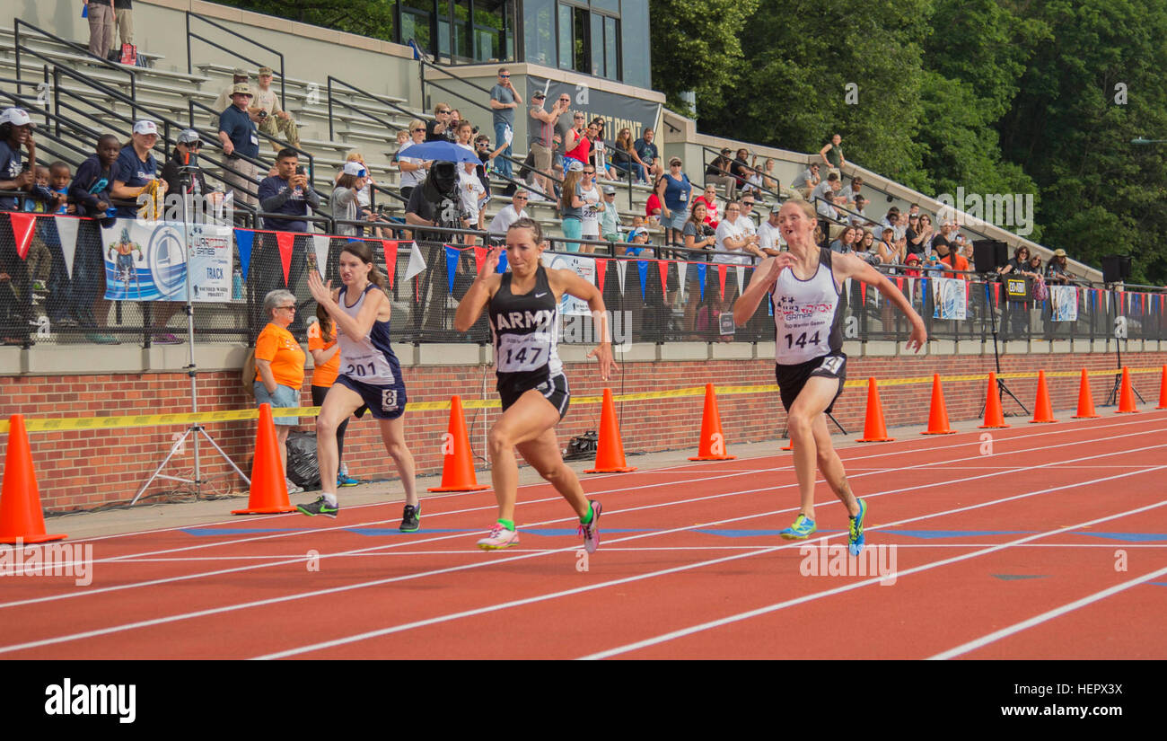Team Army athletes participate in the 100-meter sprint event during the ...