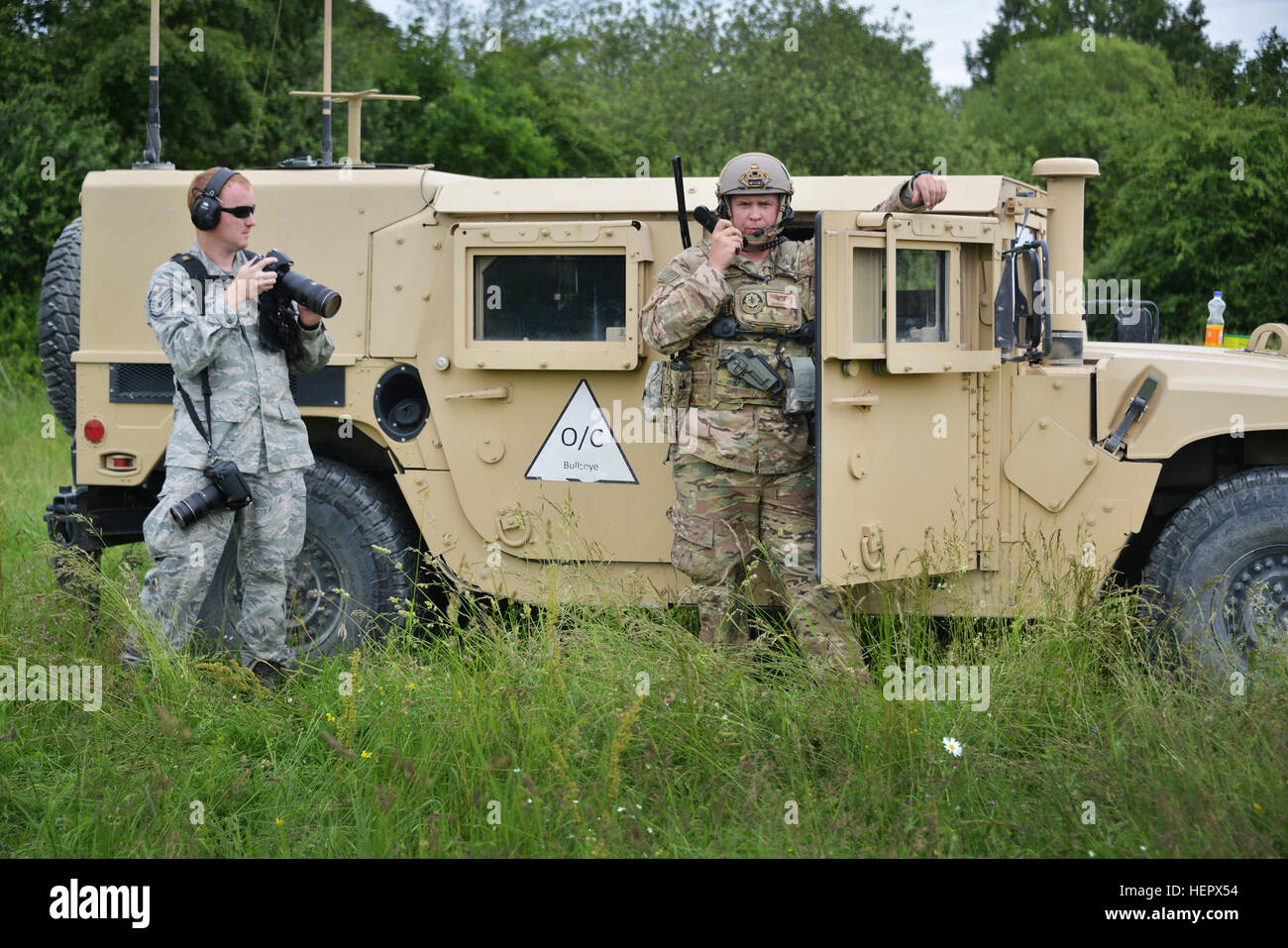 U.S. Air Force Maj. Aaron A. Cook (right), an Air Mobility Liaison ...