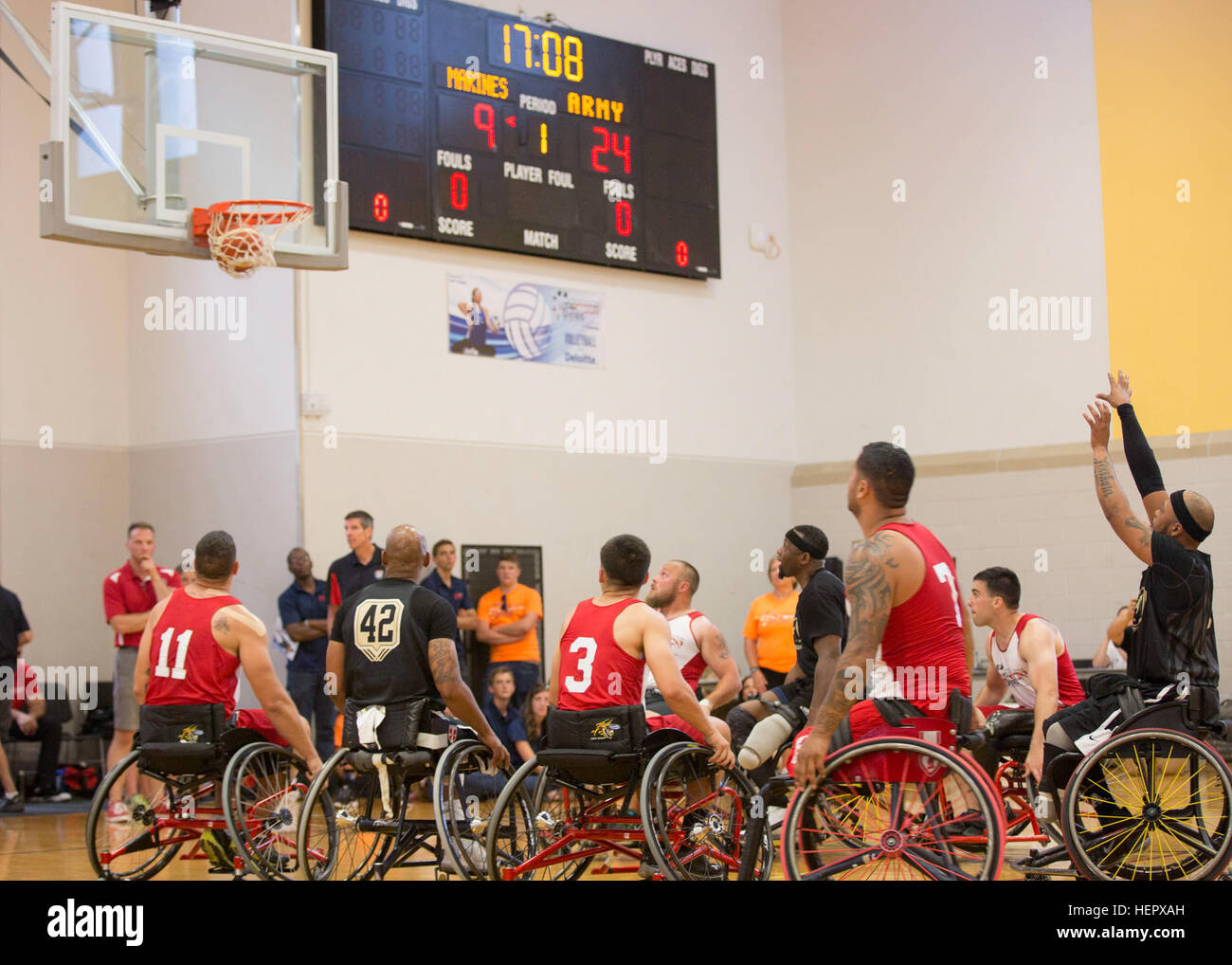 U.S. Army Veteran Sgt. Delvin Maston, attempts to make a shot, during ...
