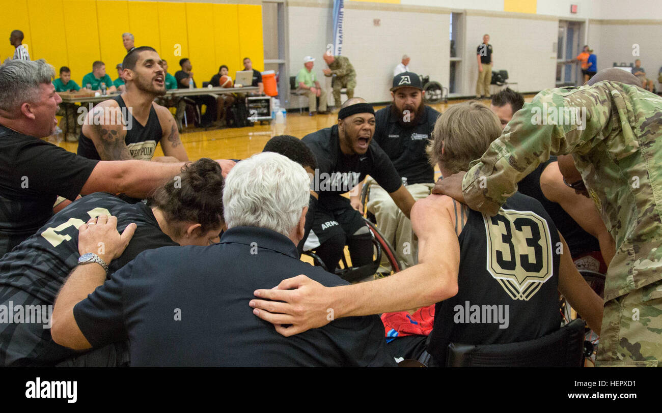 Team Army athletes huddle before competing in a wheelchair basketball ...
