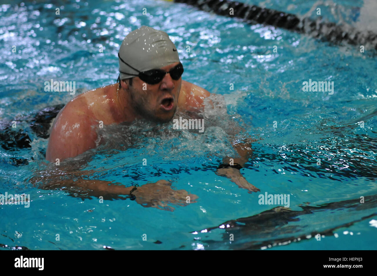 Team SOCOM member Christopher "Lars" Lofgren powers through the water ...