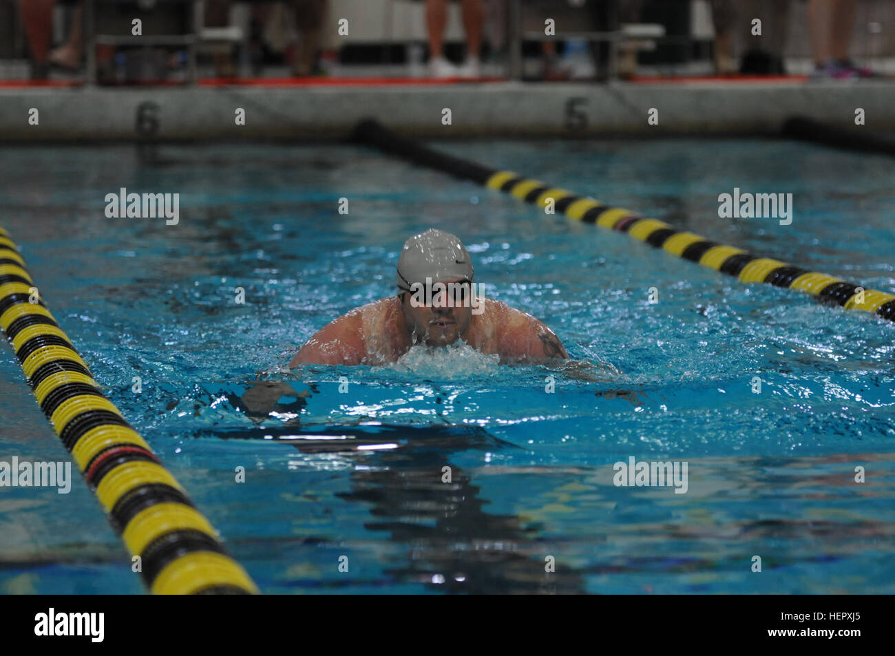 Team SOCOM member Christopher "Lars" Lofgren powers through the water ...