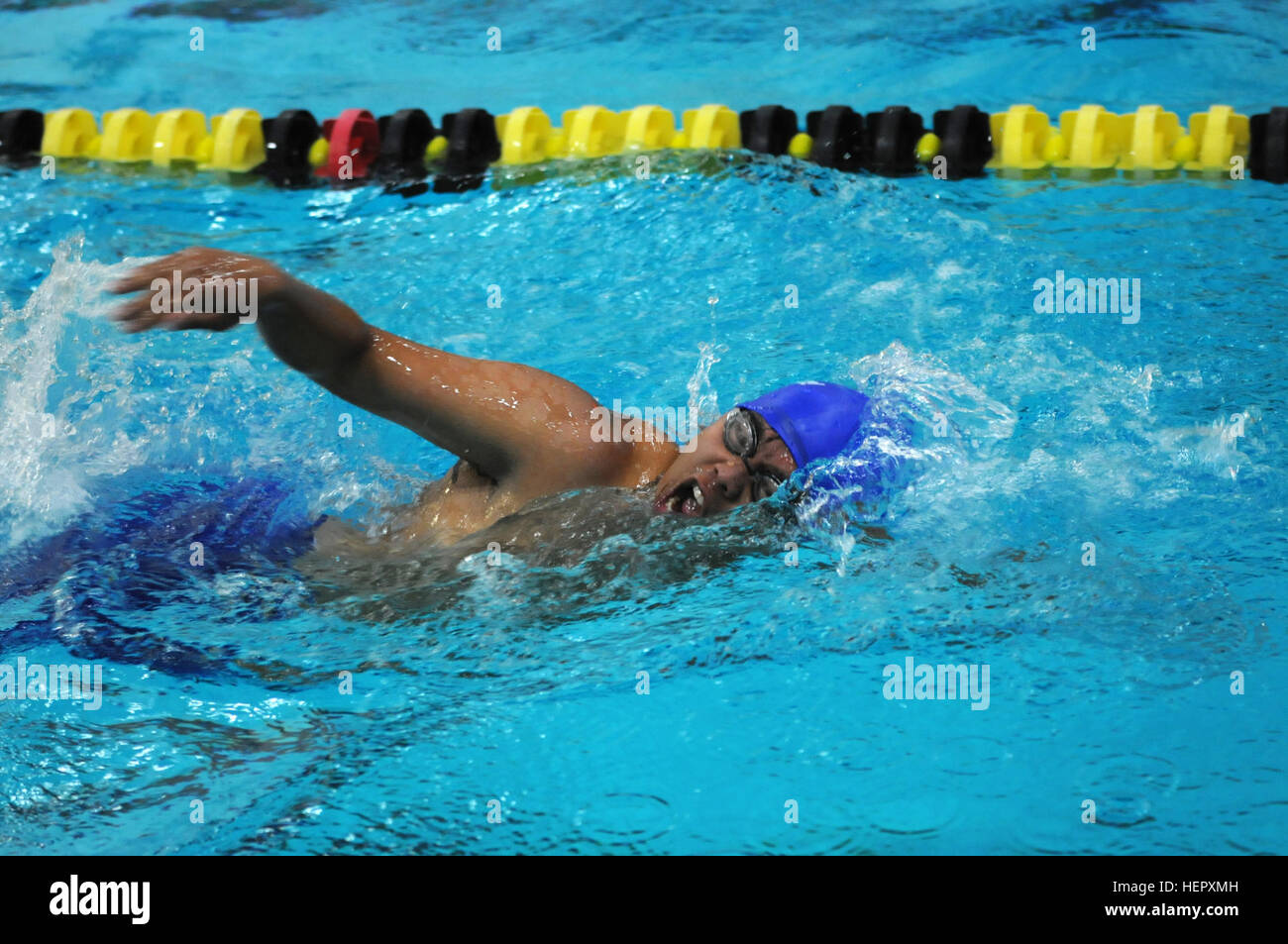 Air Force Veteran Senior Airmen Lucky Lor powers through the water ...