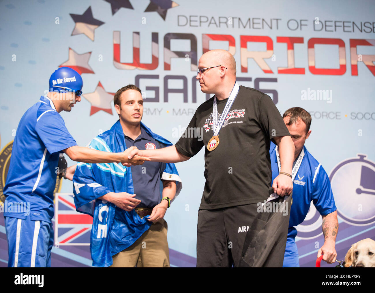 U.S. Army Veteran Staff Sgt. Sean Johnson, left, of Aberdeen, South ...