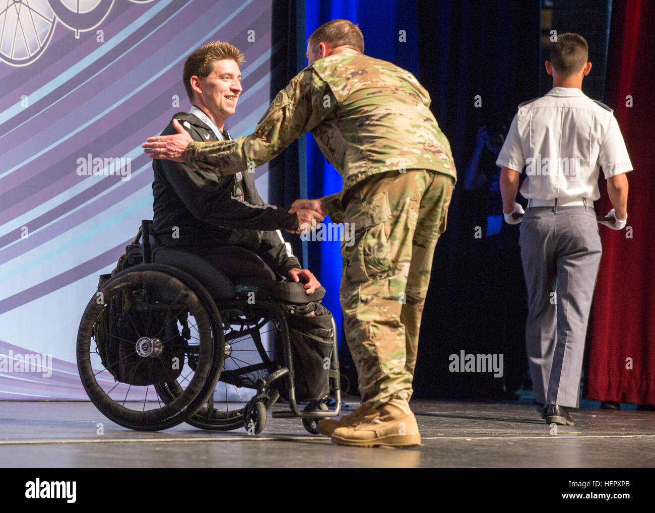 U.S. Army Veteran Sgt. Timothy Payne, of Amherst, New York, receives a ...
