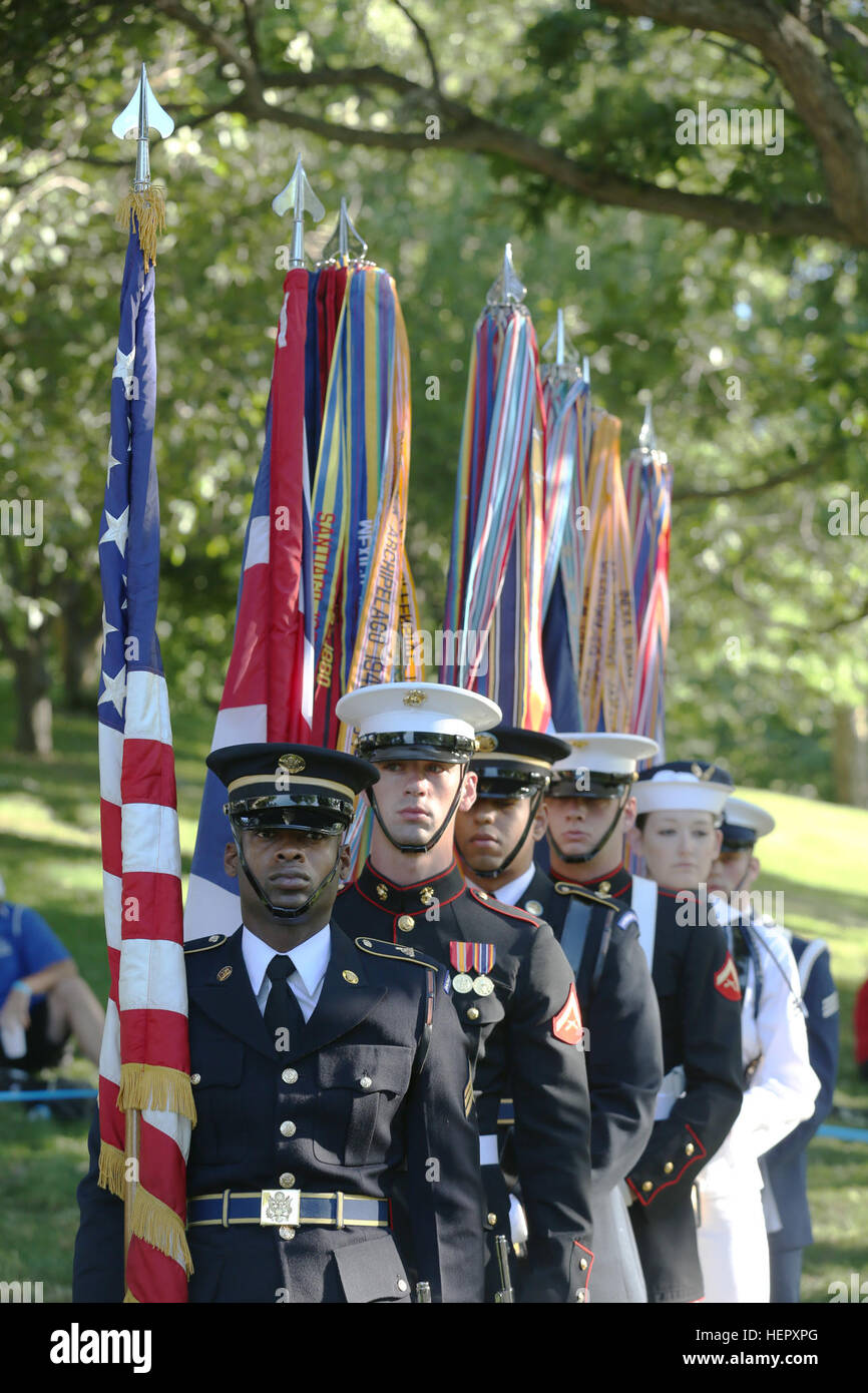 The Color guard with a Member from each branch, Army, Air Force ...