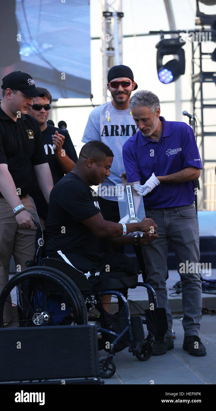 Comedian Jon Stewart, presents the "Heart of the Team" award to U.S ...