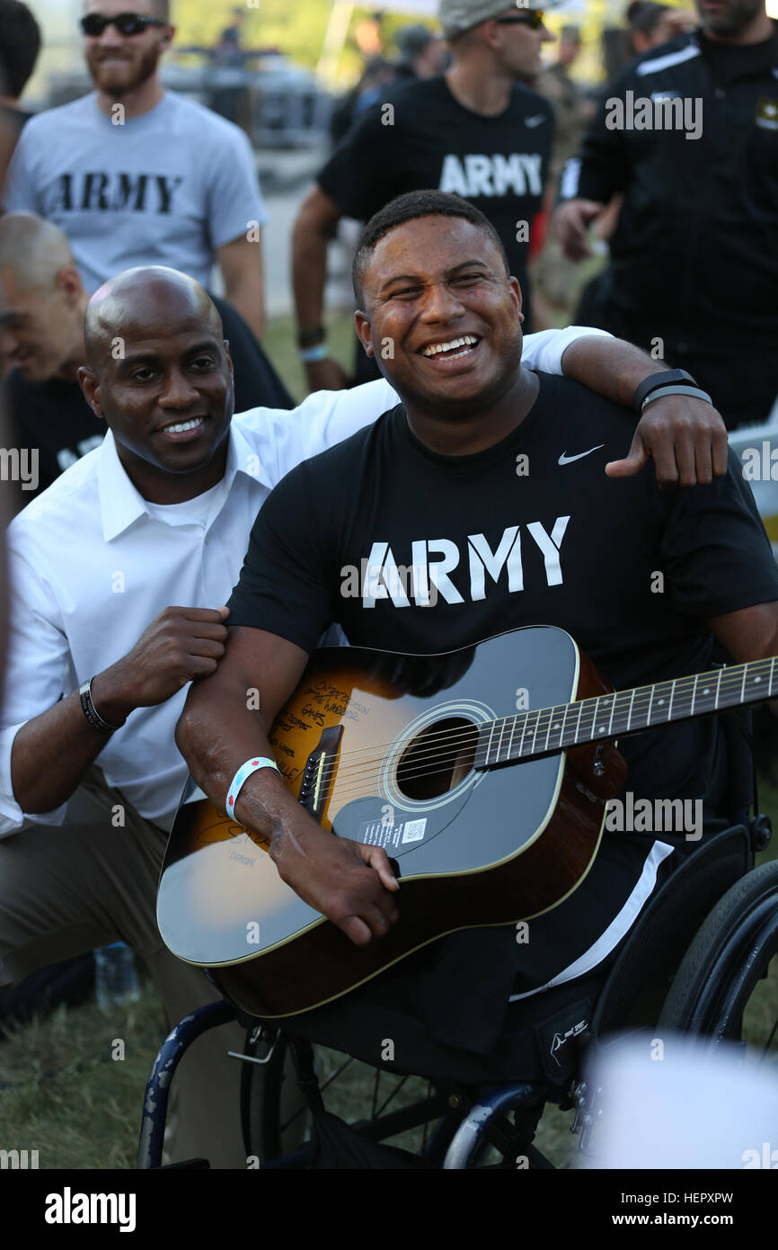 U.S. Army Veteran, Sgt. Ryan Major, of Baltimore, Maryland, receives a ...