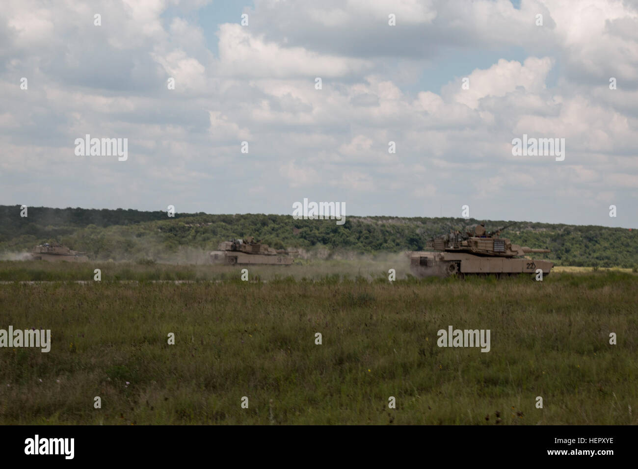 Three M1A2 Abrams tank crews from Company B, 3rd Battalion, 8th Cavalry ...