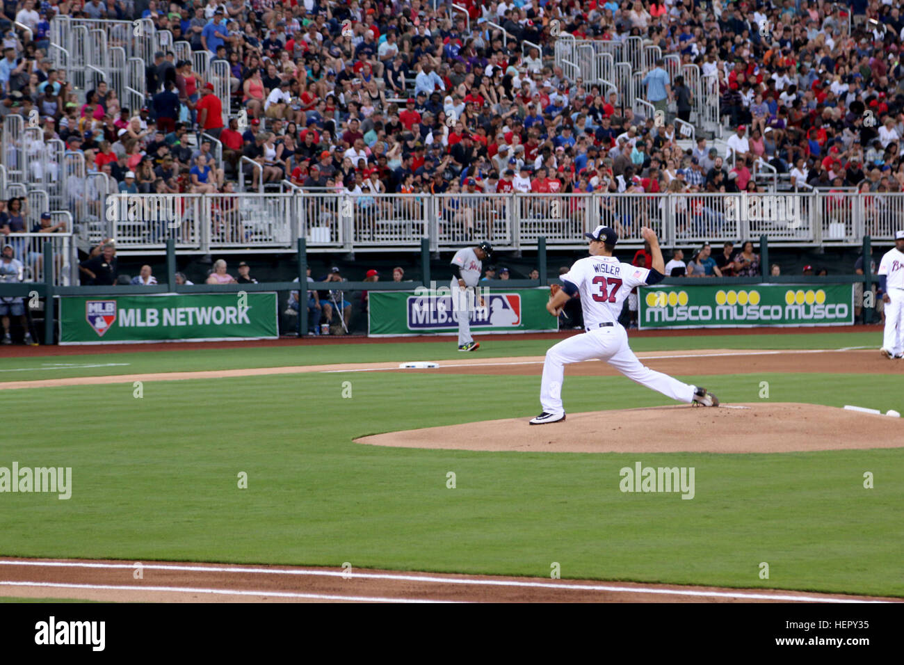 Atlanta Braves pitcher Matt Wisler throws the first pitch of the game ...