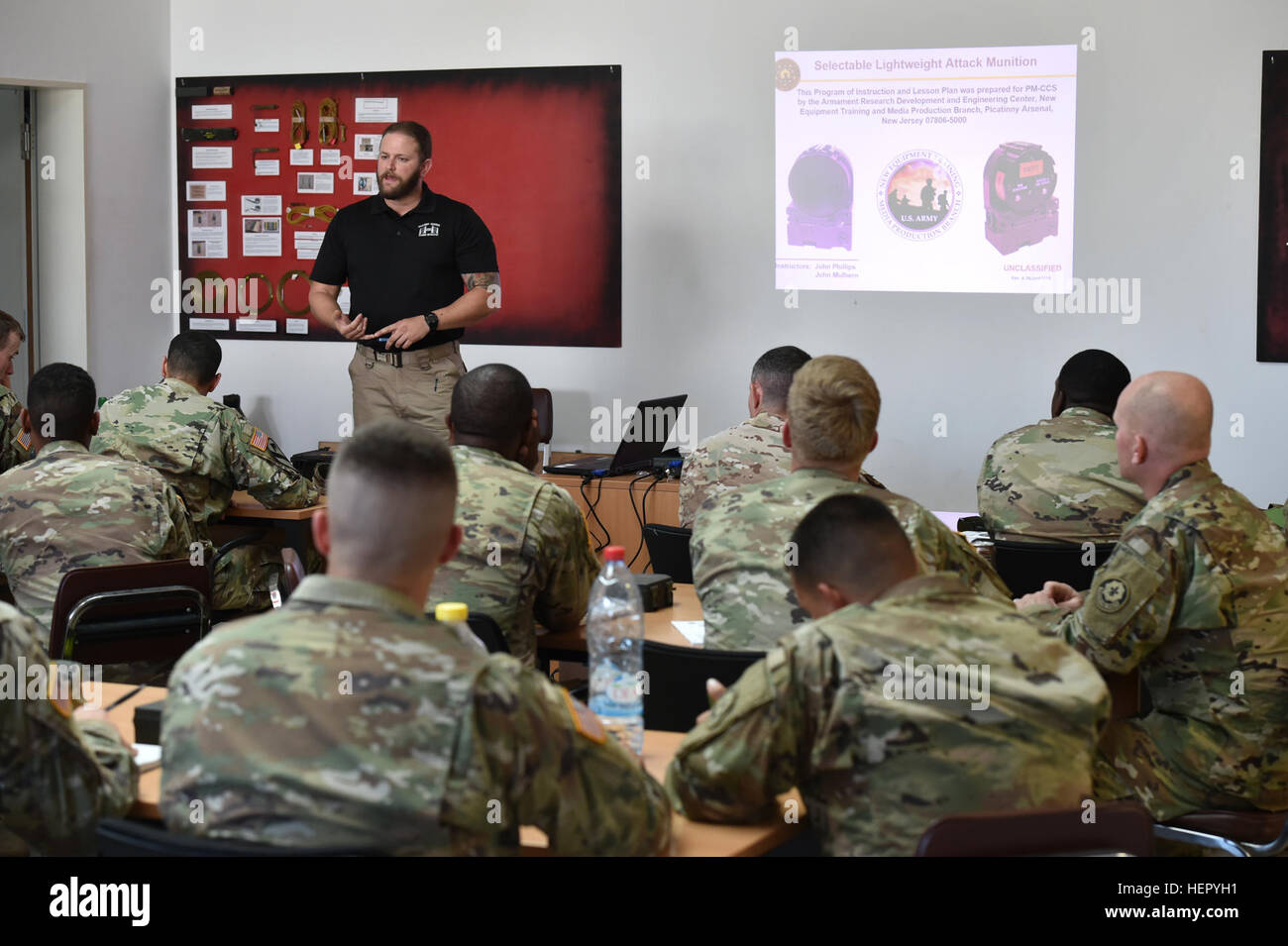 John Phillips, standing, a New Equipment Training Instructor, gives a ...