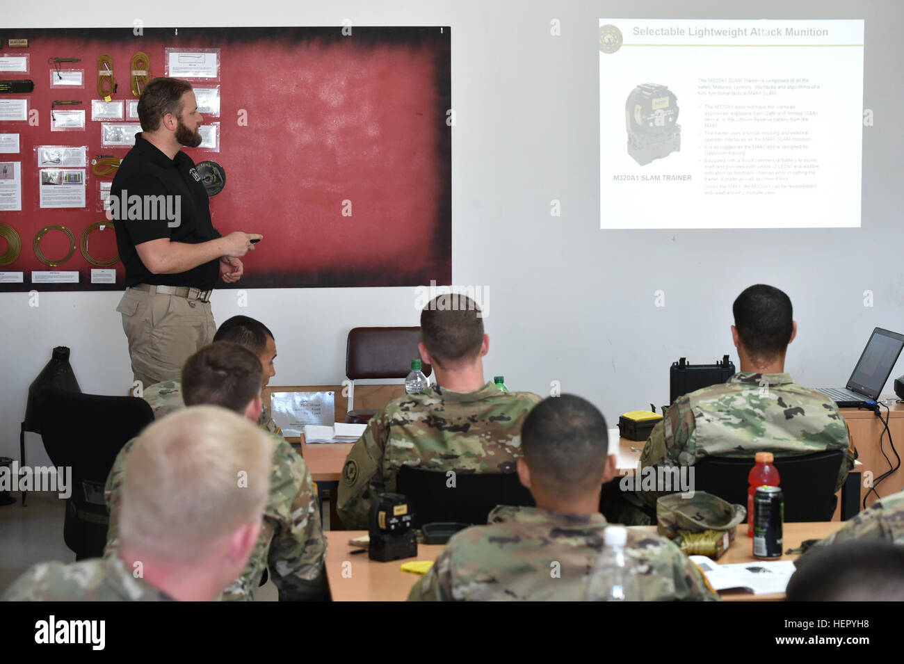 John Phillips, standing, a New Equipment Training Instructor, gives a ...