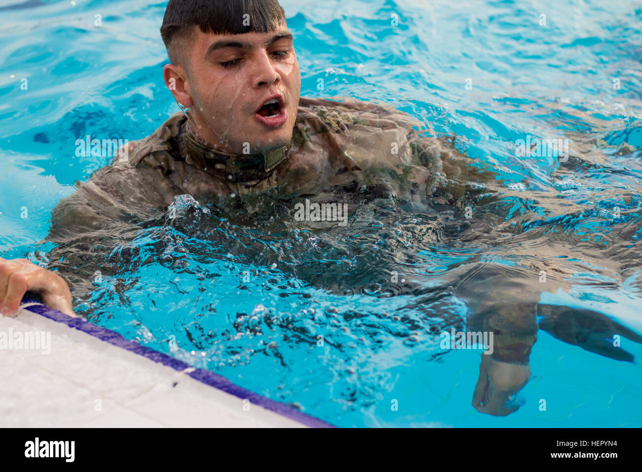 A U.S. Soldier catches his breath before continuing the swim test on ...