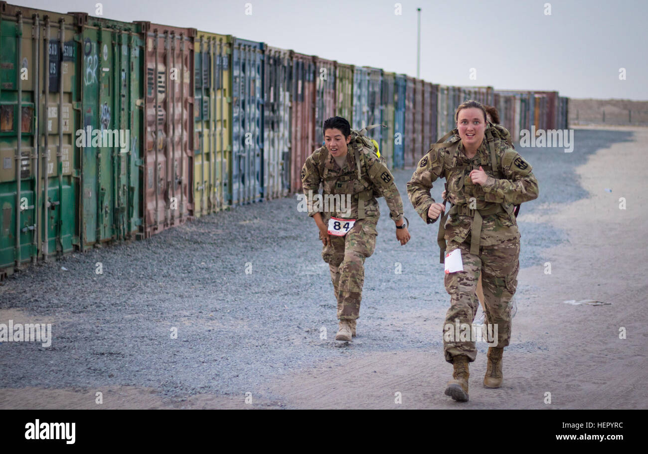 Soldiers ruck at sunrise carrying a 33-pound load as part of the German ...