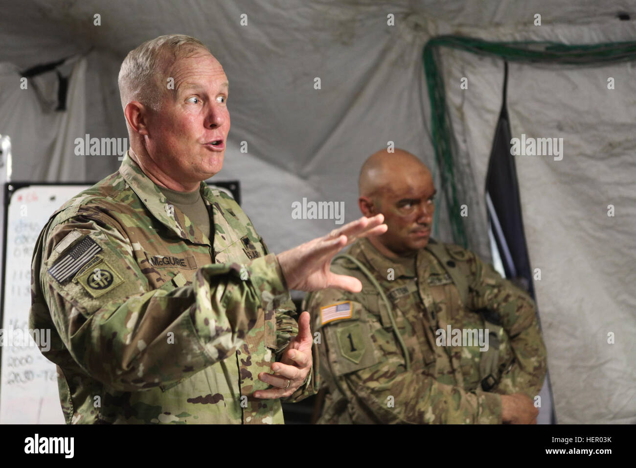 U.S. Army Major General Tim Mcguire, left, and U.S. Soldiers of 10th ...