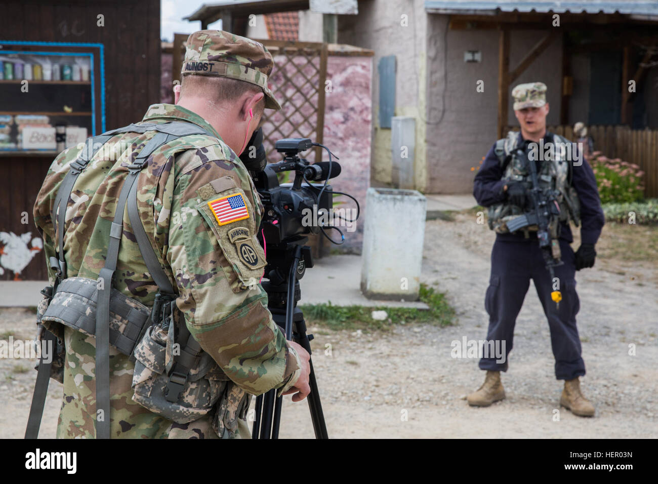 A U.S. Soldier, right, of 1st Infantry Regiment, 4th Infantry Battalion ...