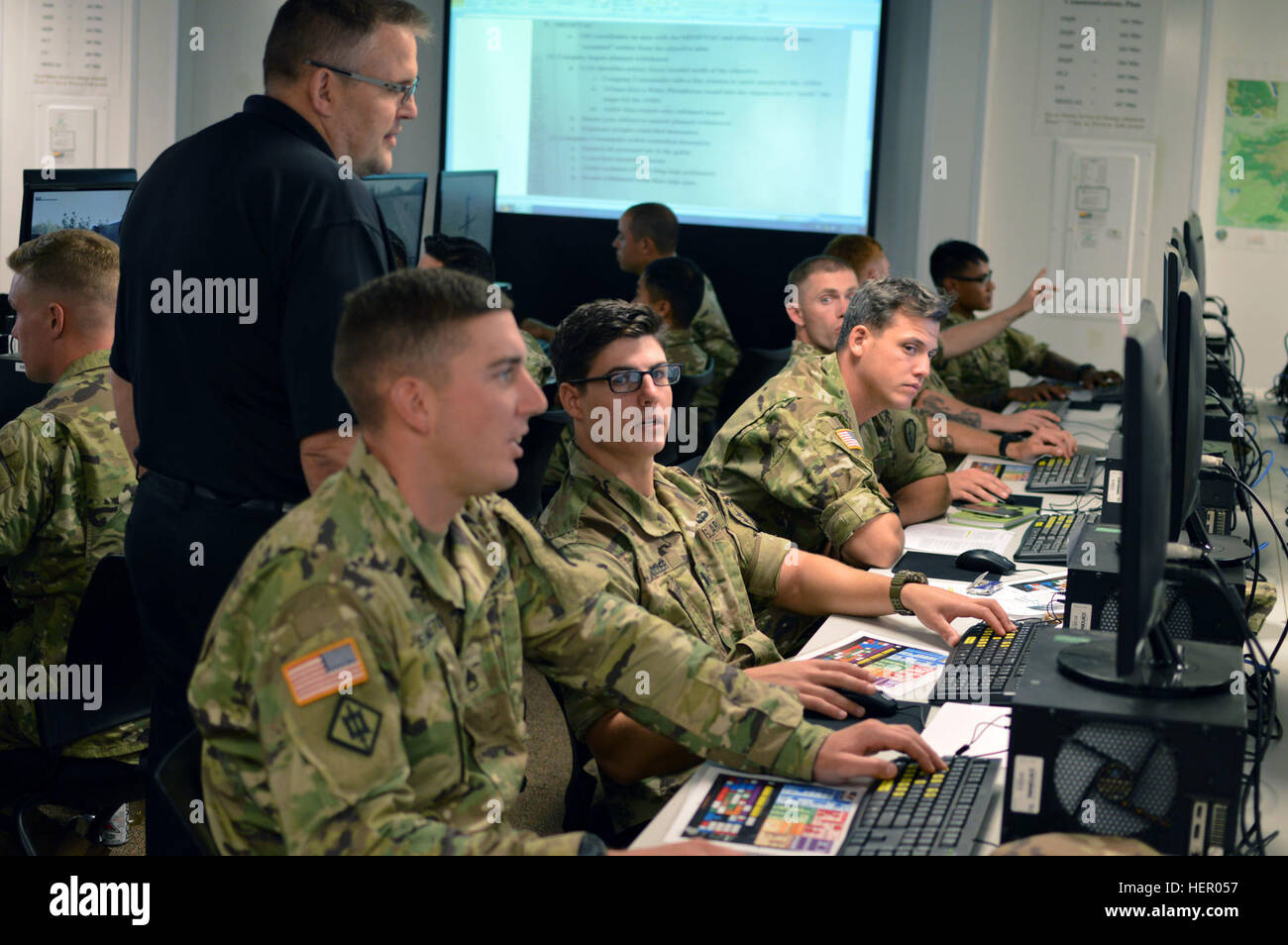 Larry Hahn (standing), simulations branch, Mission Training Complex ...