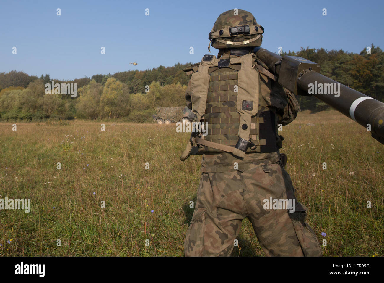 A Polish soldier of 2nd Motorized Battalion fires a simulated GROM ...