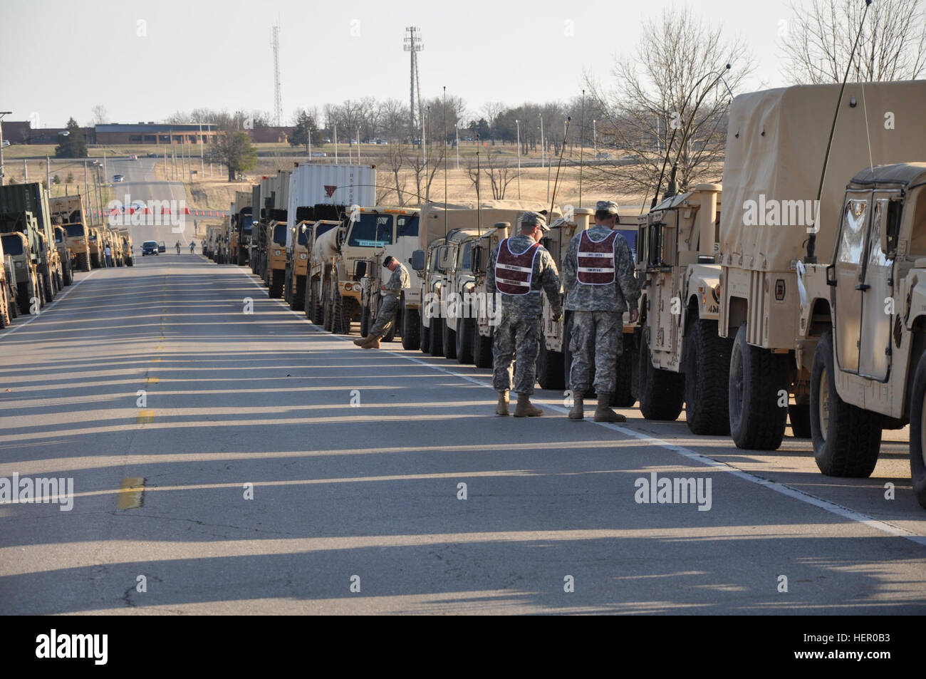 Soldiers from the 103rd Engineer Company conduct security checks on the ...