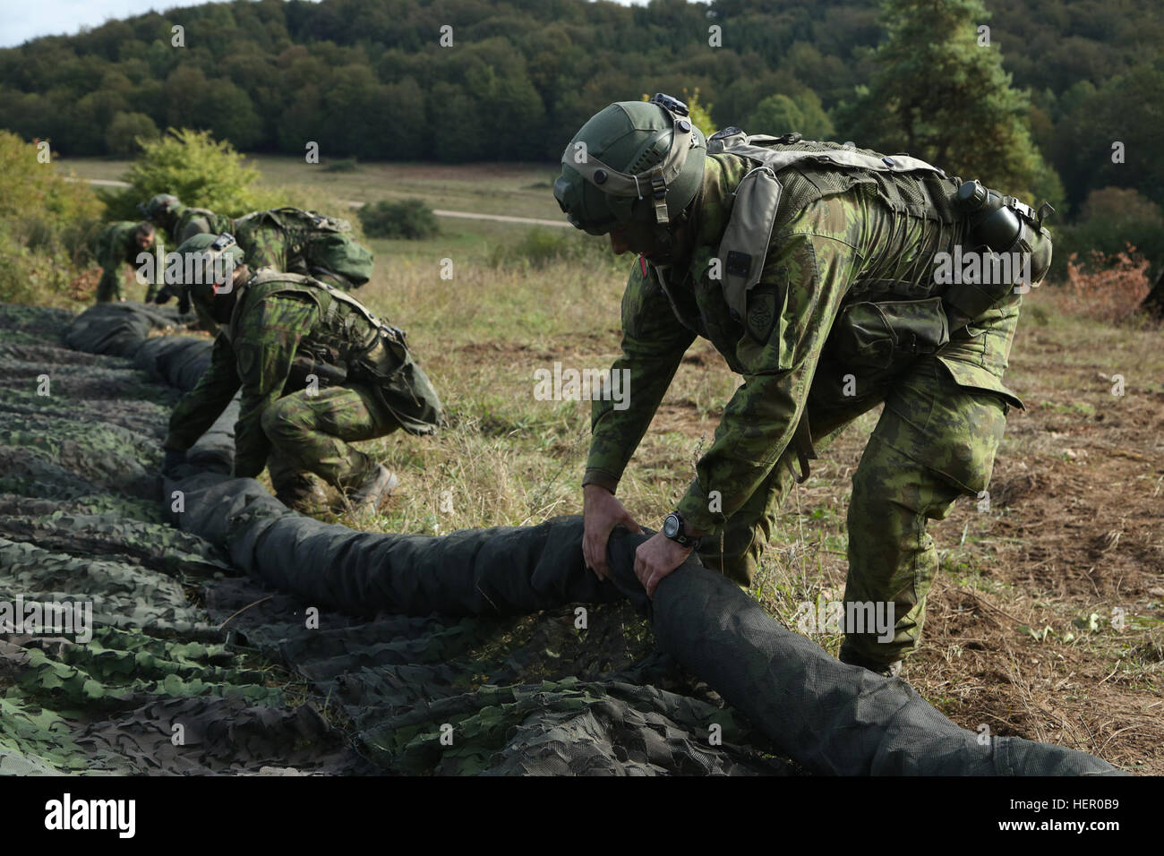 Lithuanian soldiers of the Mechanized Infantry Brigade Iron Wolf roll ...