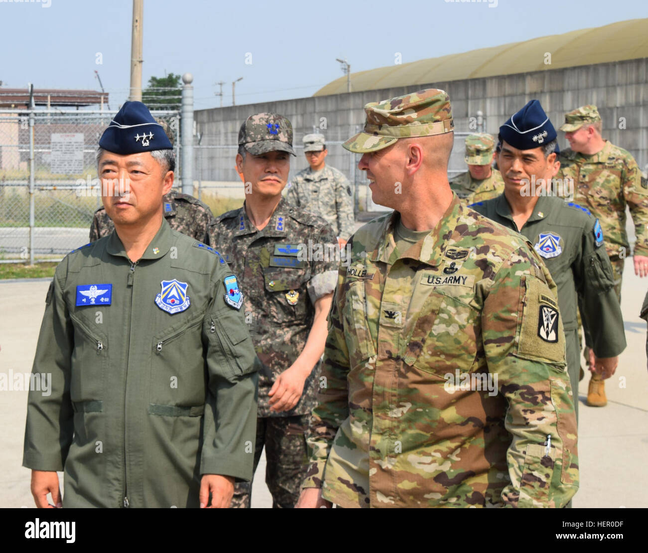 Col. Mark Holler, 35th Air Defense Artillery Brigade commander, right ...