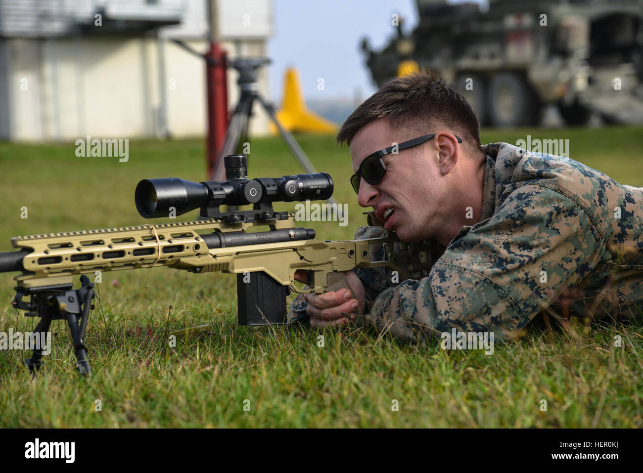 A U.S. Marine engages the target during the Day Shot event as part of ...