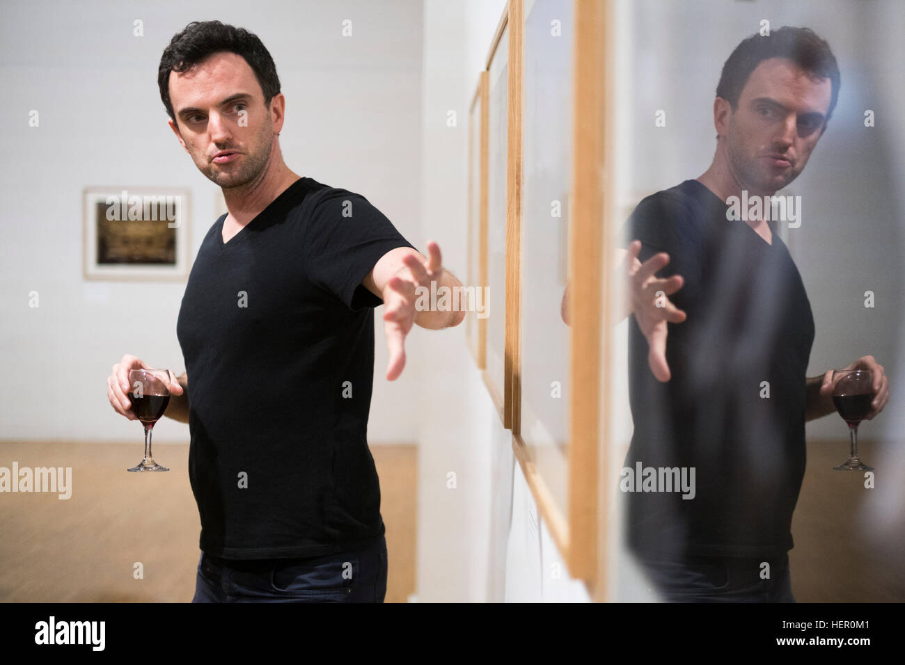 Myles Little, curator, talking about the photographs in the exhibition ...