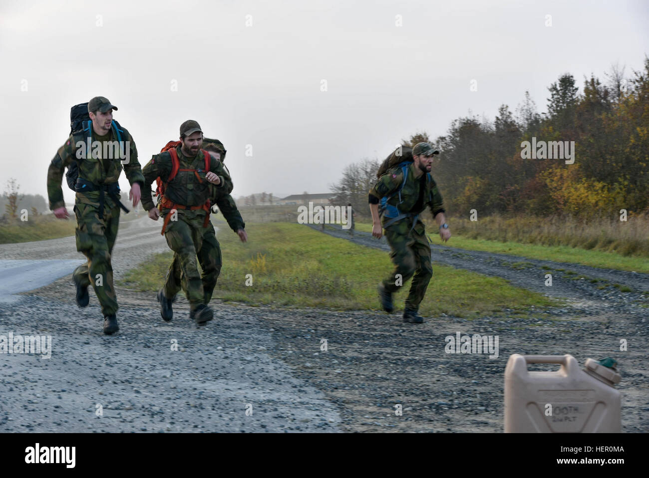 Norwegian soldiers participate in the 12 mile Ruck March event as part ...