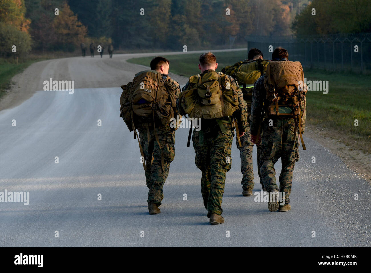 U.S. Marines participate in the 12 mile Ruck March event as part of the ...