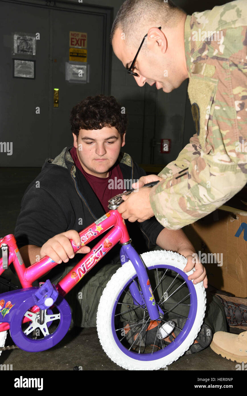 Boy Scouts and New York National Guard personnel assemble bikes at ...