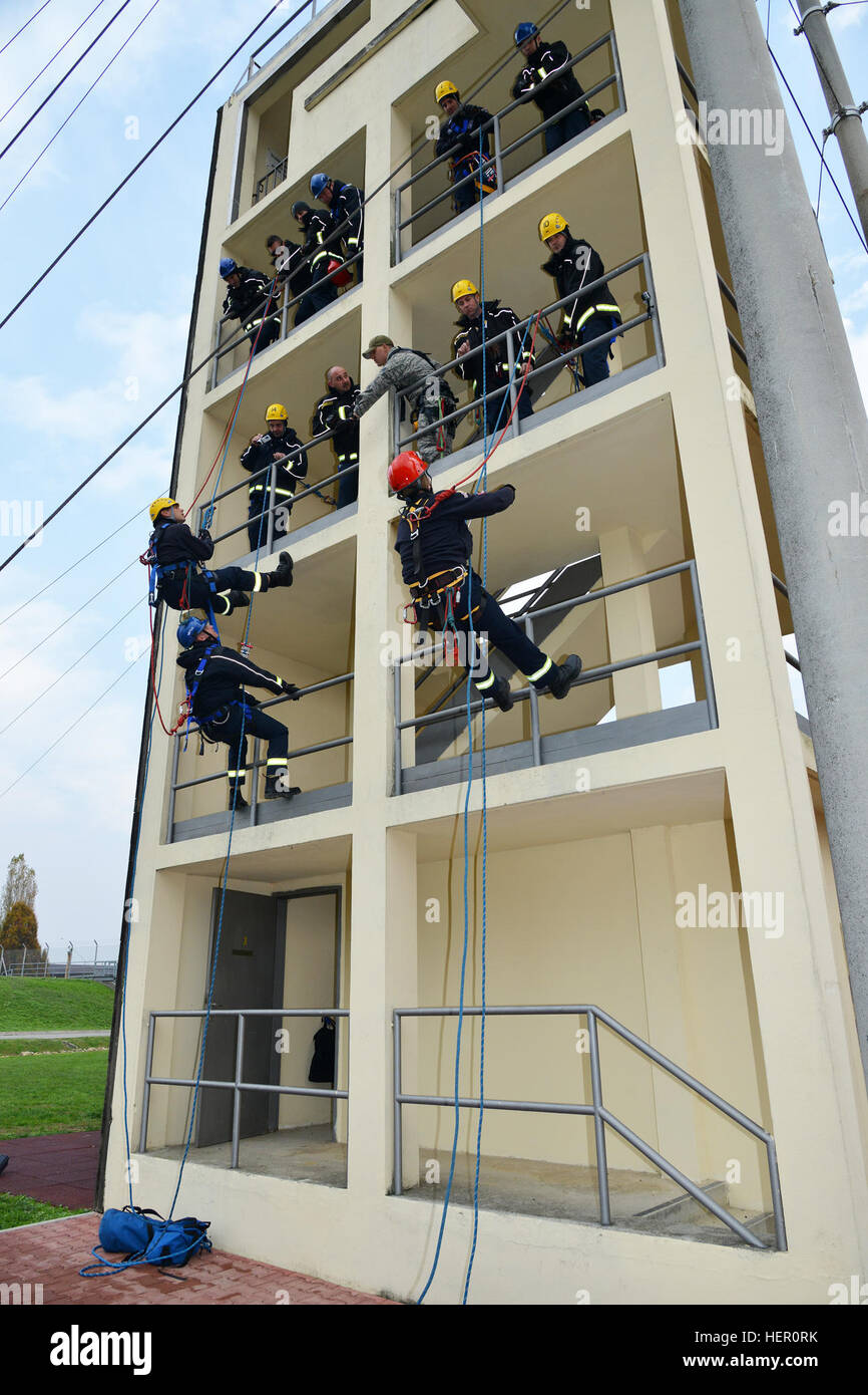 Firefighters assigned to U.S. Army Garrison Italy, rappel to rescue a ...