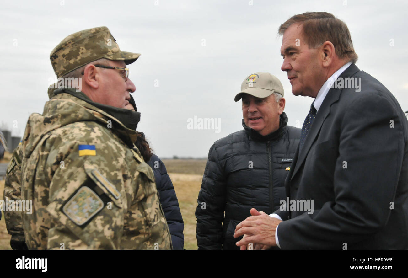 YAVORIV, Ukraine— Tom Ridge (right), former United States Secretary of ...