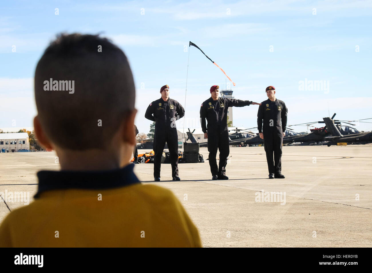 A young boy observes as members of the U.S. Army Golden Knights line up ...
