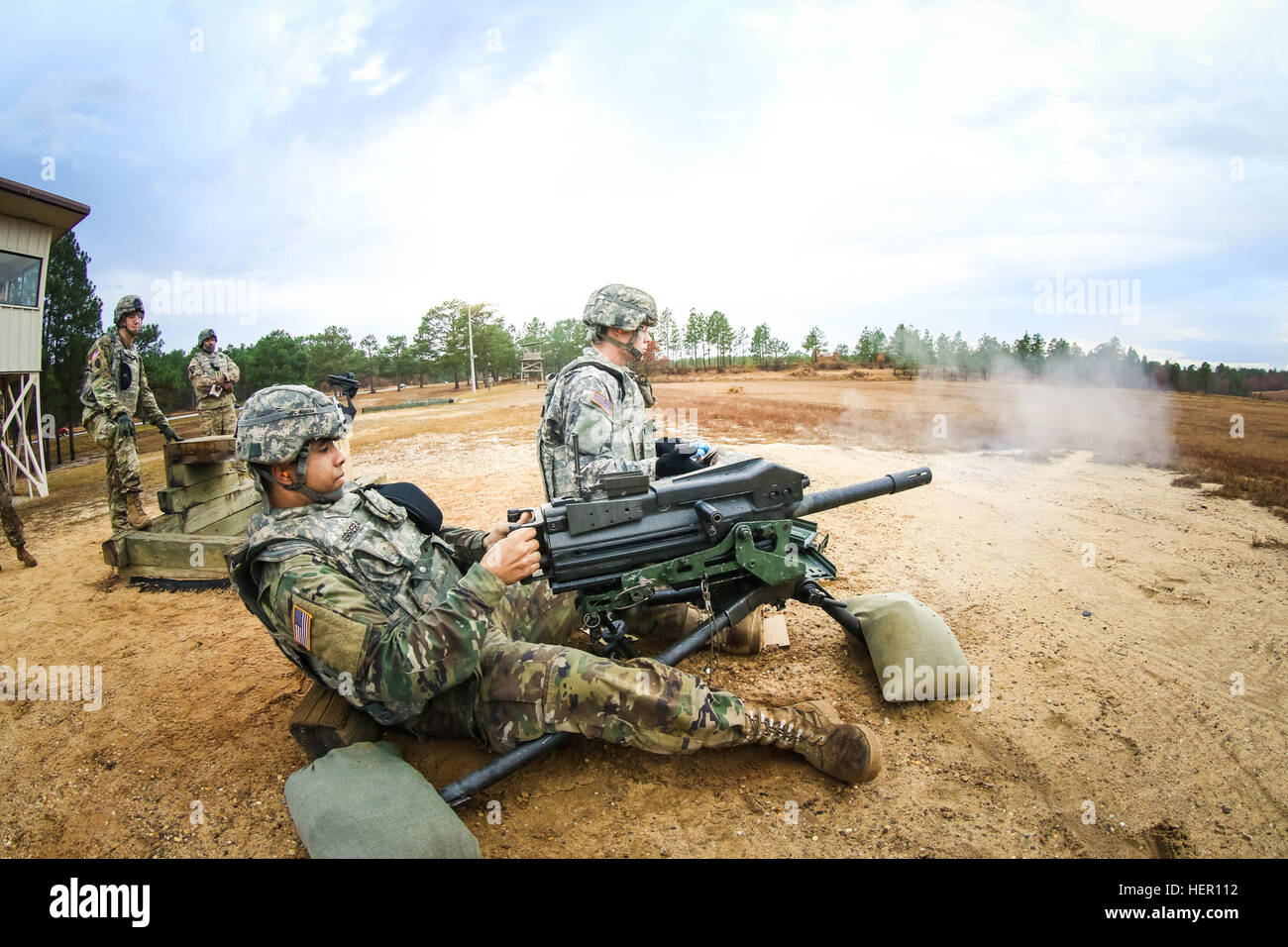 A soldier with the 82nd Combat Aviation Brigade fires an MK19 grenade ...