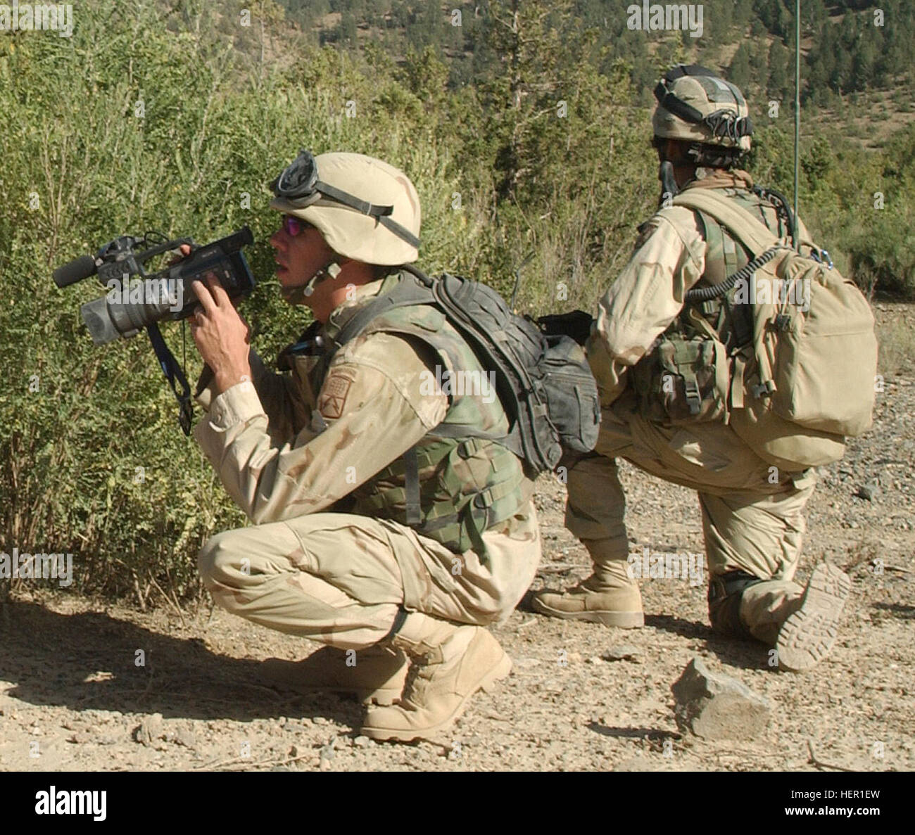 Combat camera operators from the 55th Signal Company document U.S. Army ...