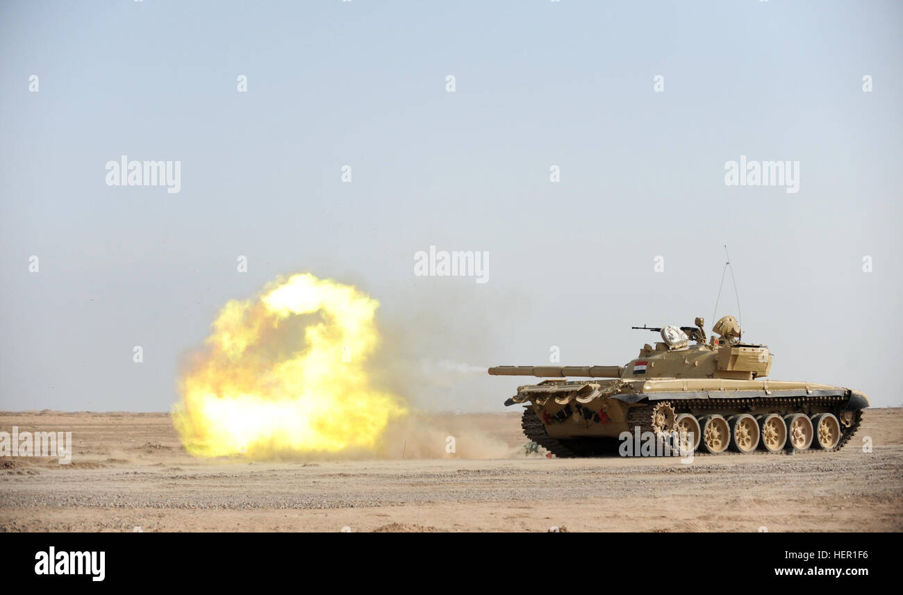 An Iraqi T-72 tank fires, during a live fire training exercise, at the ...
