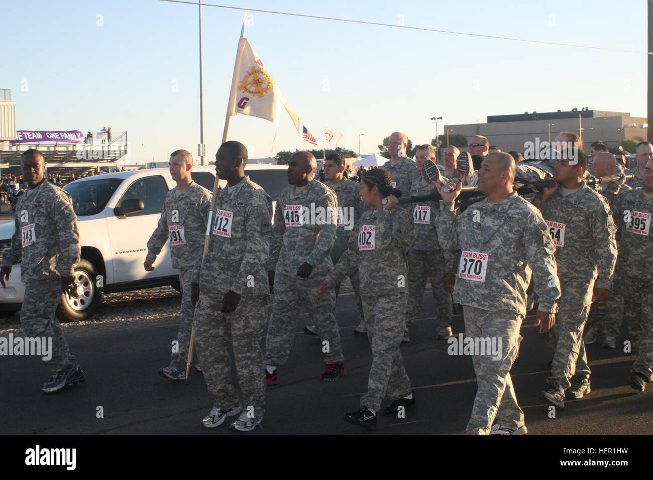 Soldiers from 501st Brigade Support Battalion carry a "wounded" comrade ...