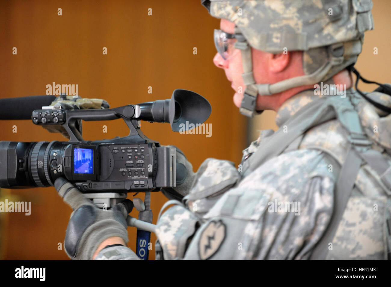 U.S. Army Spc. Neil Stanfield a Combat cameraman attached to 2nd ...