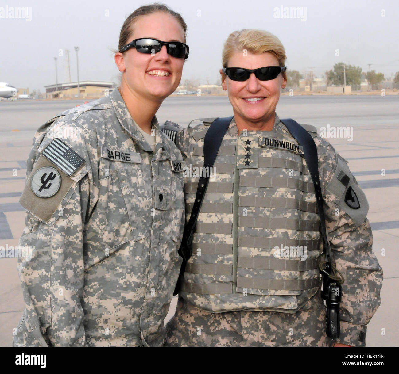 (Left to right) Spc. Jenna Barge, protocal specialist with the 103rd ...