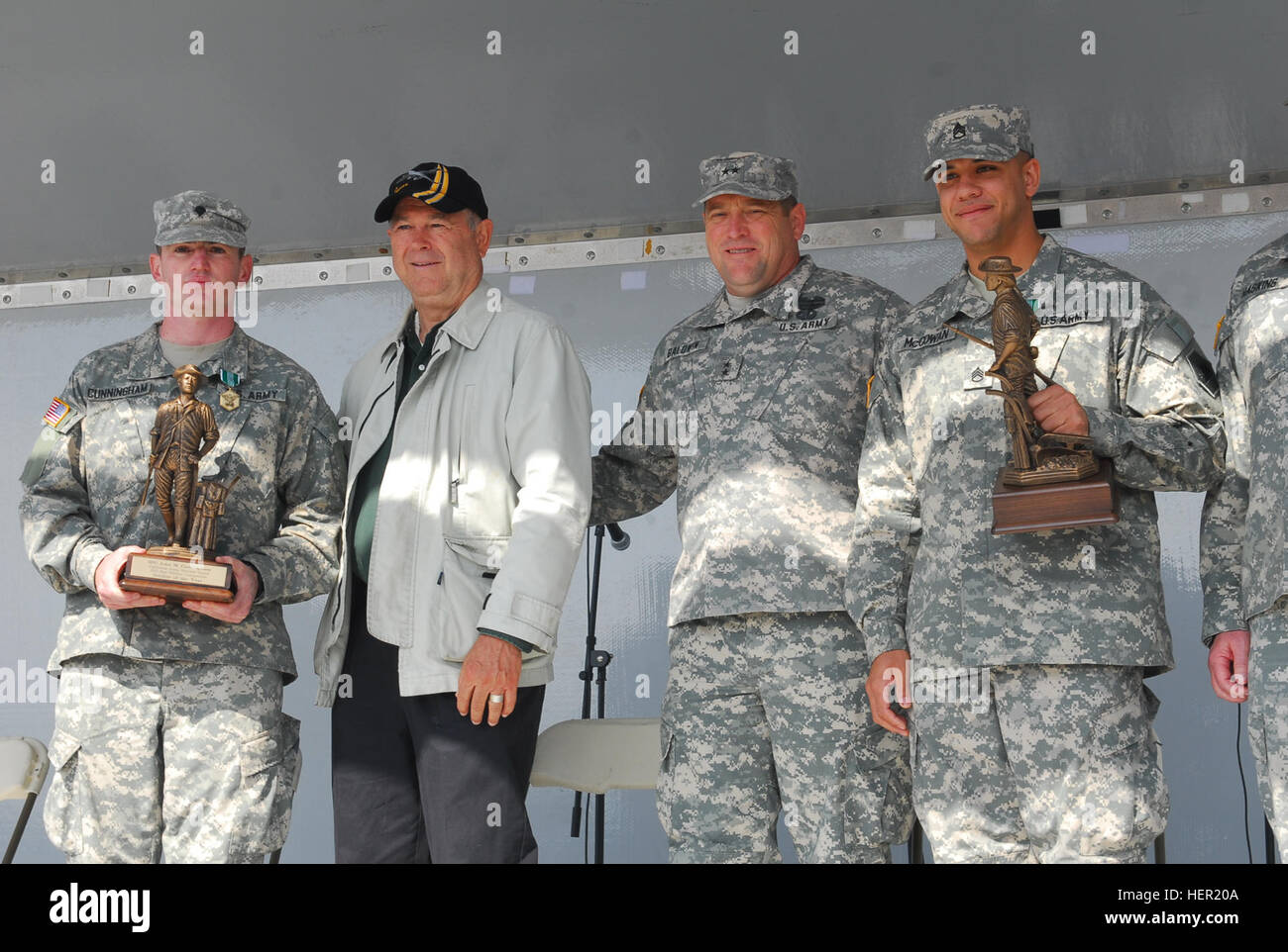 Spc. John Cunningham (left), a scout with B Troop, 1-18th Cavalry, 79th ...