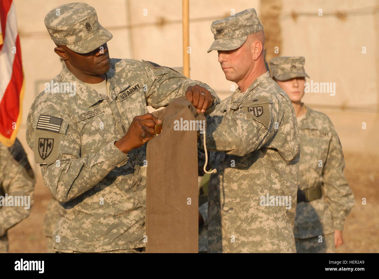 Casing the colors. BAGHDAD –Col. Mark Spindler (Right), commander, 18th ...
