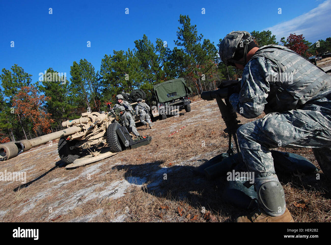 A gunner with Battery A, 2nd Battalion, 319th Airborne Field Artillery ...