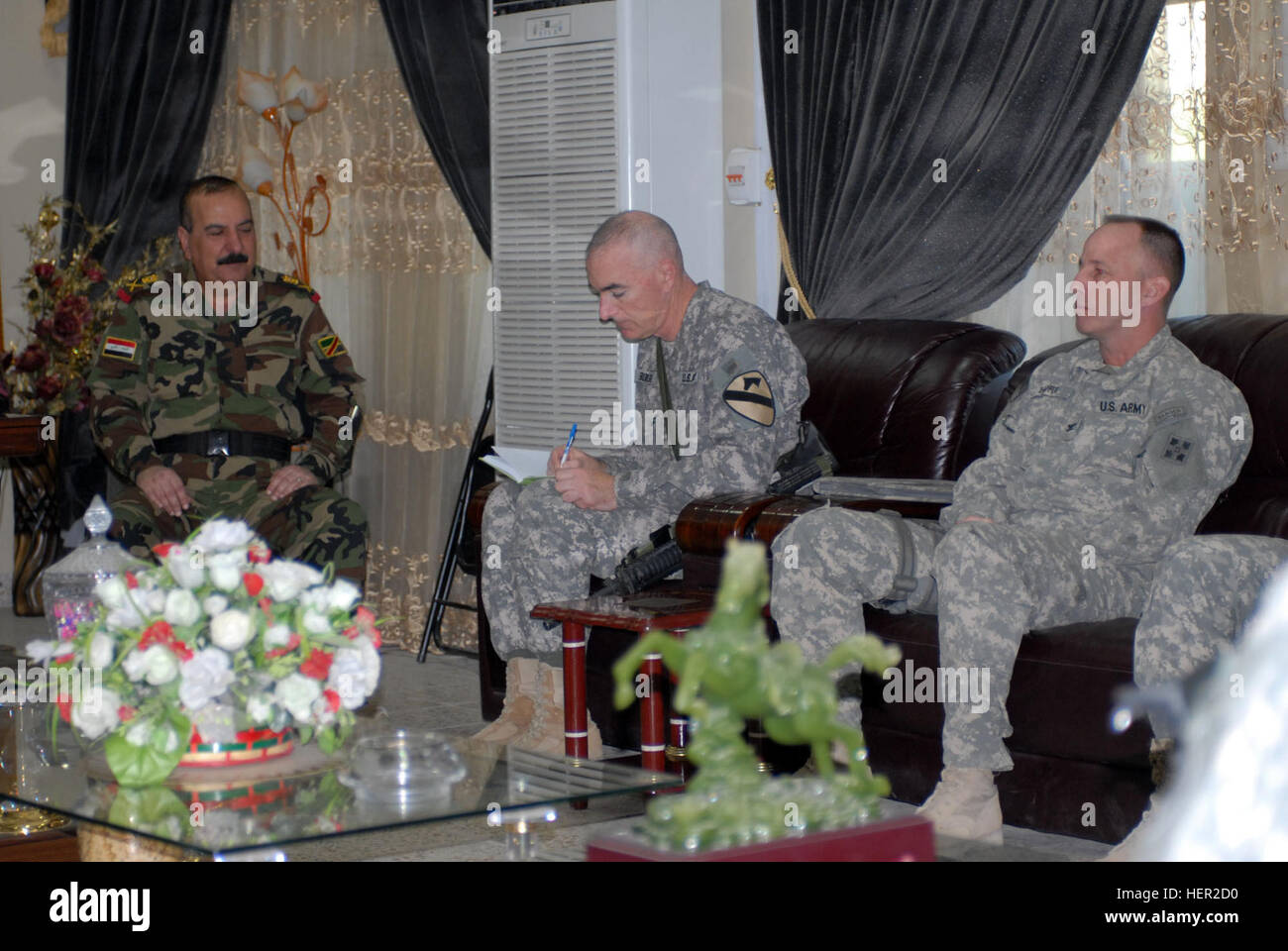 From left, Maj. Gen. Muzir, commanding general of the 11th Iraqi Army ...