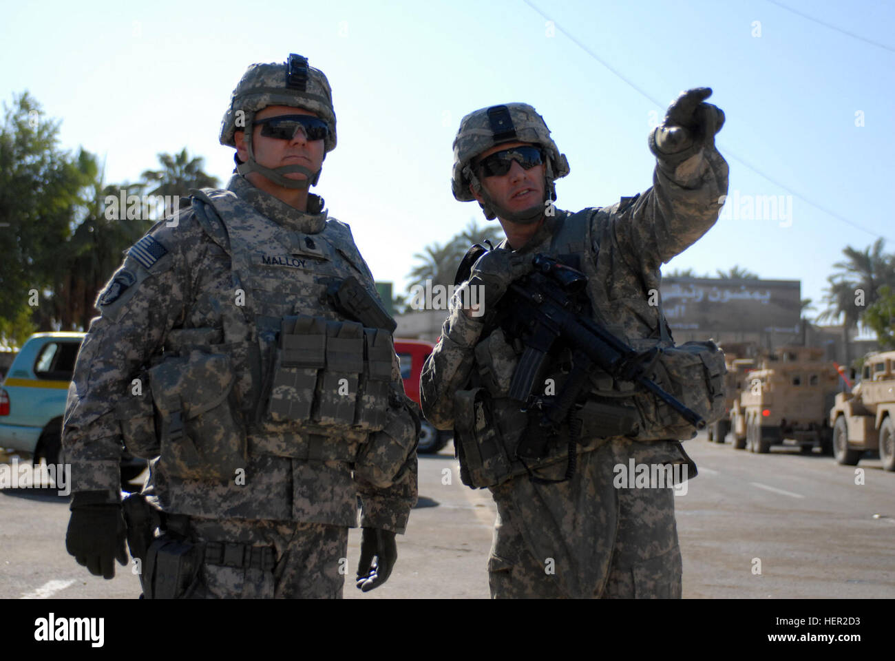 Command Sgt. Maj. Rory Malloy (left), senior enlisted leader for 1st ...