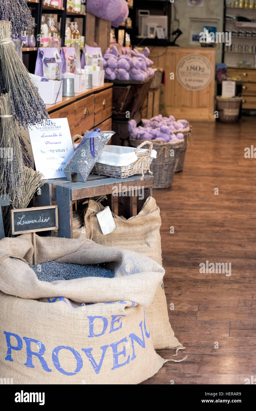 bag with lavender and shelf with dried lavender in front of shop for ...