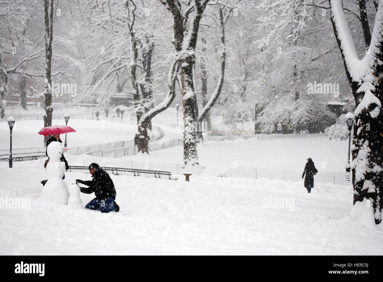 Red umbrella winter snow hi-res stock photography and images - Alamy