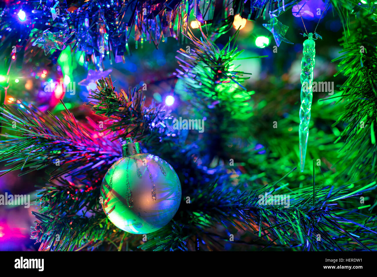 Silver tinsel christmas tree hi-res stock photography and images - Alamy