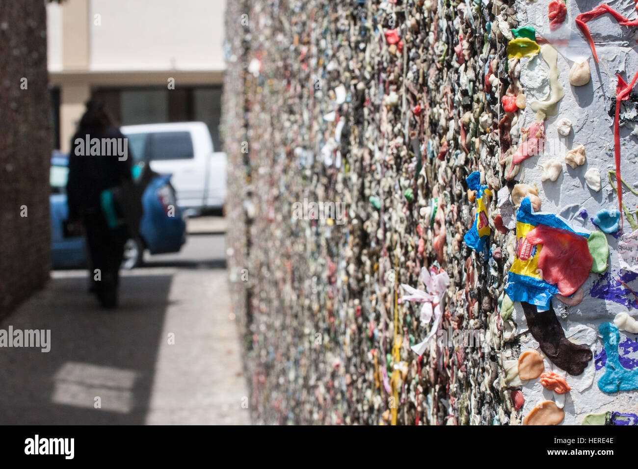 narrow path wall covered in chewing gum, Bubblegum Alley, a student ...