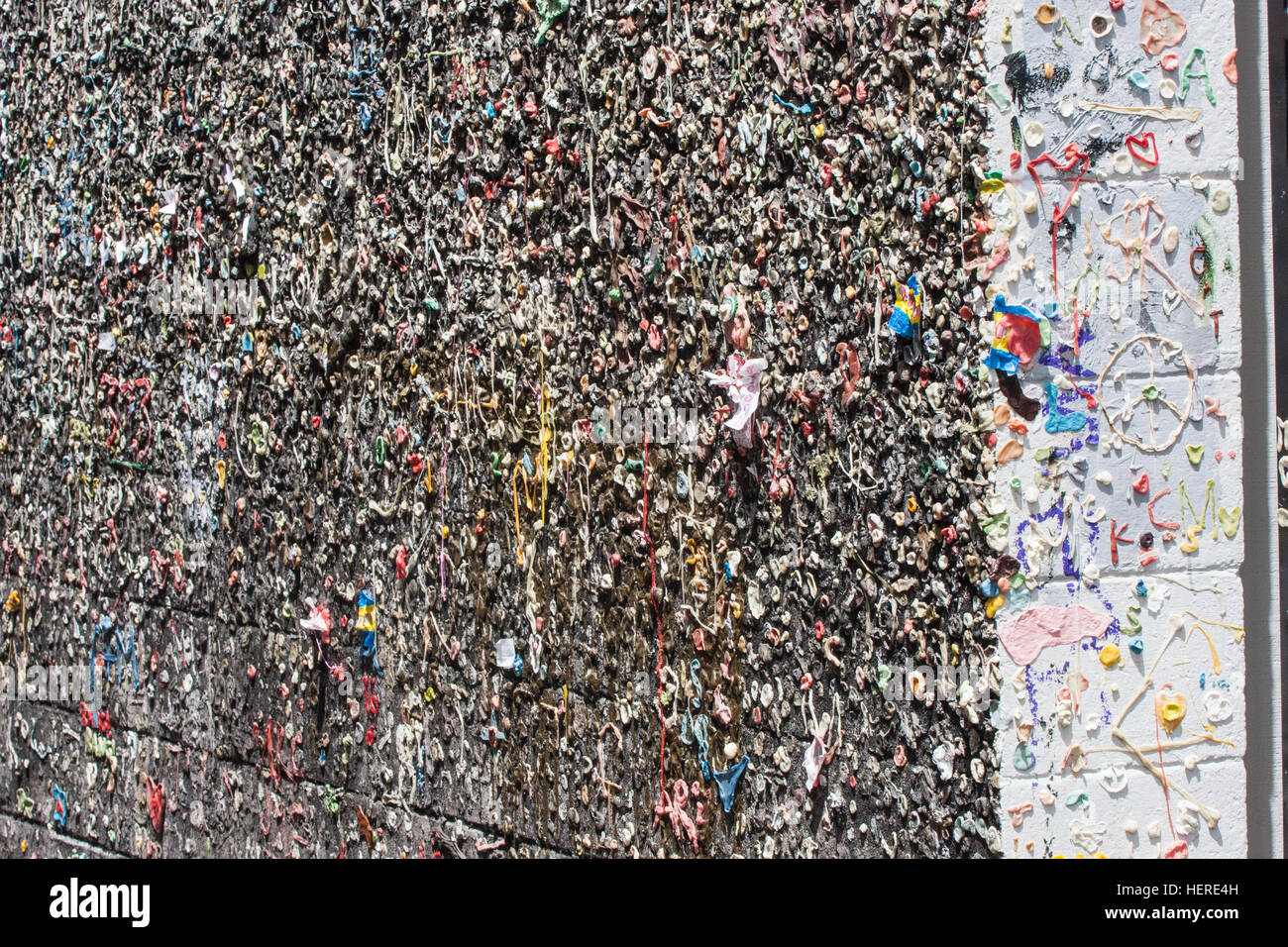 narrow path wall covered in chewing gum, Bubblegum Alley, a student ...